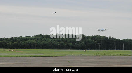 A NASA Global Hawk unmanned aerial vehicle lands after completing its ...