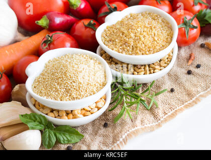 Millet, spelt, bulgur and vegetables Stock Photo - Alamy