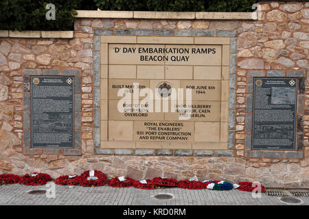 A memorial plaque at Beacon Quay in Torquay marking the embarkation of ...