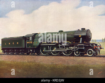 LNER steam locomotive 4472 "Flying Scotsman" leaving London Kings Cross ...