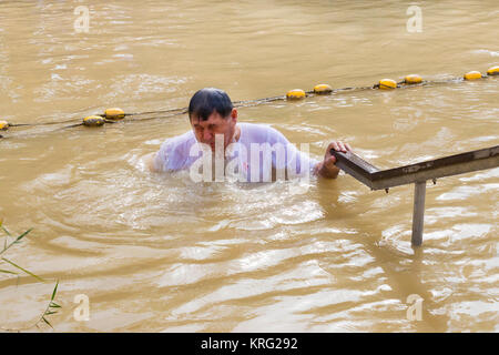 BETHABARA, ISRAEL- 25 NOVEMBER 2017: Pilgrims from different countries ...