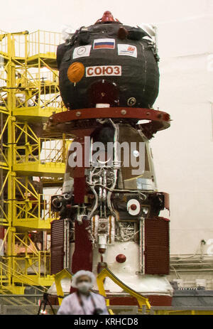 The Soyuz fairing is seen laying horizontal in front the of the Soyuz ...