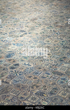 background of ancient medieval floor tiles dating from the 13th century ...
