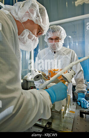 NASA engineers at Kennedy Space Center removed the vibration fixture ...