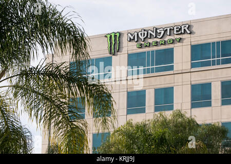 A logo sign outside of the headquarters of the Monster Beverage ...