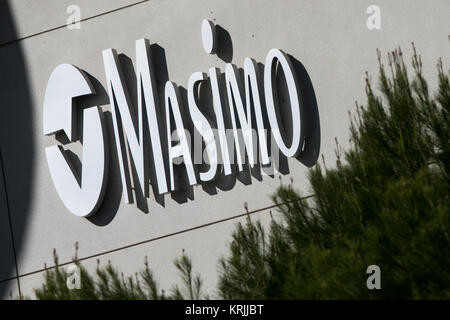 A logo sign outside of the headquarters of Masimo in Irvine, California ...