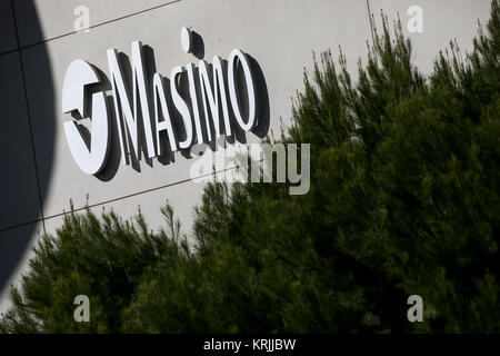 A logo sign outside of the headquarters of Masimo in Irvine, California ...