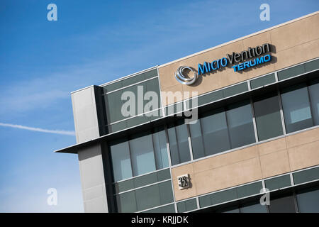 A logo sign outside of the headquarters of MicroVention, Inc., in Aliso ...