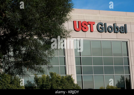 A logo sign outside of the headquarters of UST Global in Aliso Viejo ...