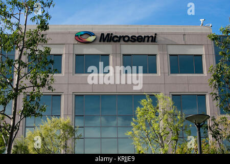 A logo sign outside of the headquarters of the Microsemi Corporation in ...