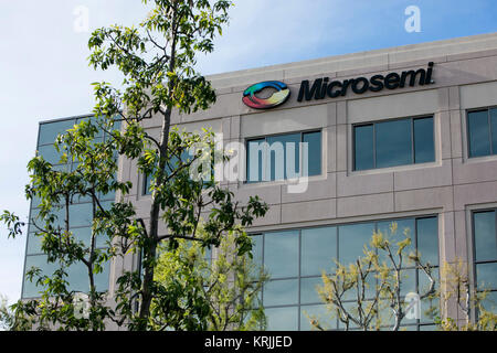 A logo sign outside of the headquarters of the Microsemi Corporation in ...