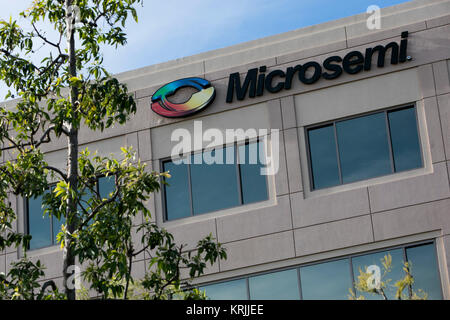 A logo sign outside of the headquarters of the Microsemi Corporation in ...