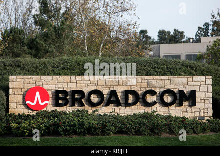 A logo sign outside of the headquarters of the Broadcom Corporation in ...