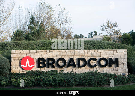 A logo sign outside of the headquarters of the Broadcom Corporation in ...