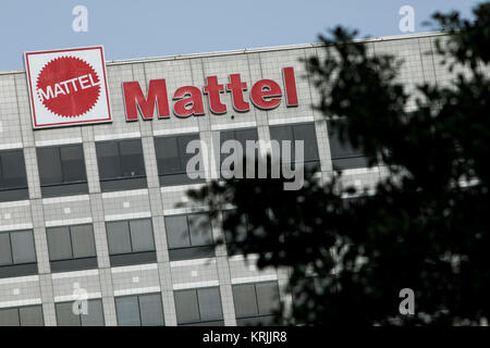 A logo sign outside of the headquarters of Mattel, Inc., in El Stock ...