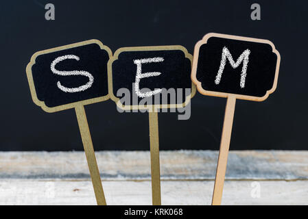 Acronym SEM - Search Engine Marketing. Wooden small cubes with letters ...