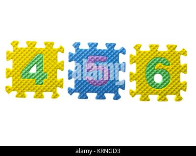 numbered rubber puzzle pieces on white Stock Photo - Alamy