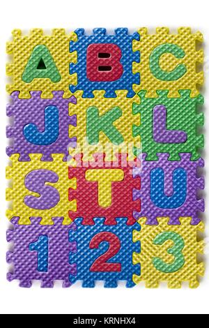 Multi-colored puzzle cubes in the colorful background; table game with ...