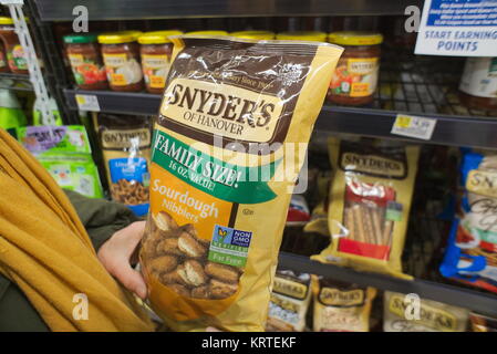 Packages of Snyder's brand snacks are seen in a supermarket in New York ...