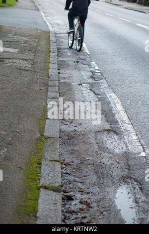 Poor quality broken bicycle / bike / cycle lane / lanes with cracked ...
