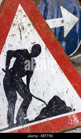 Closeup of a work in progress caution turn sign in Milan, Italy Stock ...