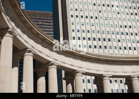 Millennium Monument in Wrigley Square at night a semicircle of paired ...