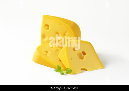 wedges of Swiss cheese Stock Photo - Alamy