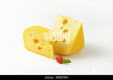 wedges of yellow cheese with eyes Stock Photo - Alamy