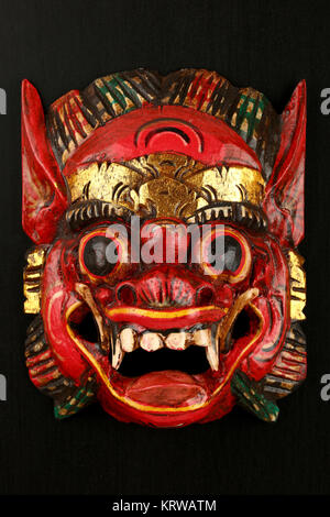 a traditional thai demon wooden mask on sale as a souvenir in the Stock ...