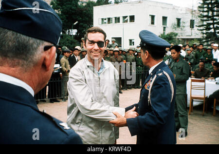 Released prisoner of war Lt. Col. Robert L. Stirm is greeted by his ...