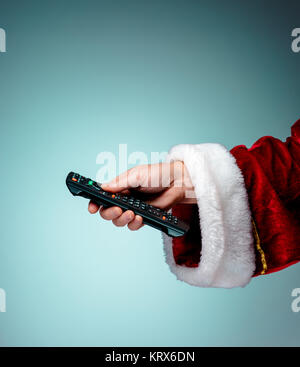 Santa claus holding a remote controller for a drone isolated on white ...