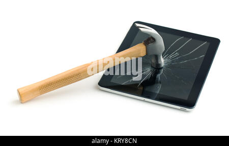 Broken laptop screen, broken glass with a hammer on it Stock Photo - Alamy