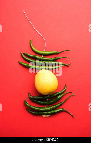 lemon chilies hanging - Indian superstitious lemon and green chillies ...