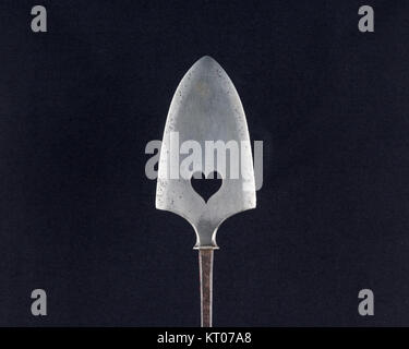 This stone arrowhead is an ancient hunting and warfare tool ...