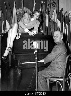 The 1945 photograph captures iconic Hollywood stars Helen Hayes, Anita ...