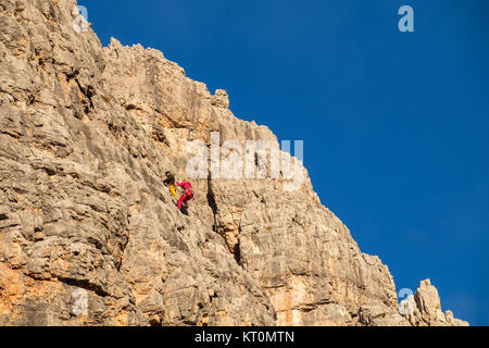 Vertical walls with climber Cinque Torri, Dolomite Alps, Italy Stock ...
