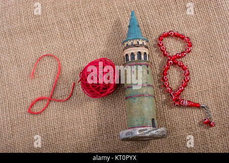 Happy Year 2018 with spool, Galata Tower and beads Stock Photo - Alamy