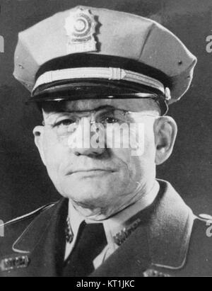 Montgomery County Police chief Charles Moose speaks at the podium as he ...