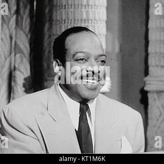 Count Basie, an influential jazz musician, is depicted on a billboard ...