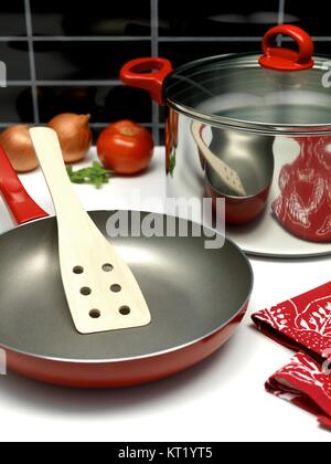 A frying pan on a kitchen bench Stock Photo - Alamy