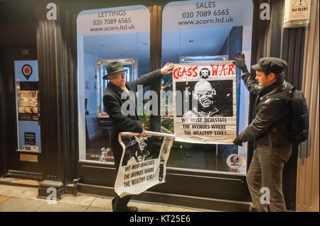 Ian Bone and Simon Elmer display the Class War poster 'We must ...