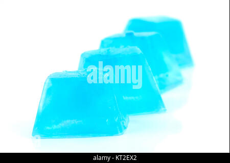 Blue ice blocks isolated against a white background Stock Photo - Alamy