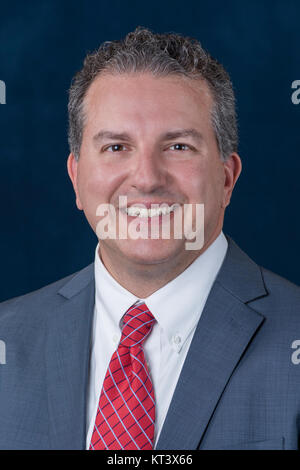 The official photo of Jimmy Patronis, a political figure, captures him ...