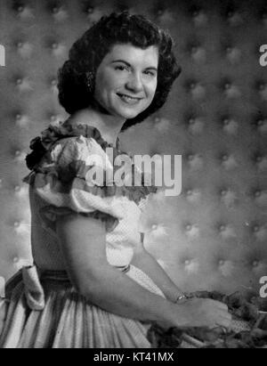 Kitty Wells, a pioneering American country music singer, is captured in ...