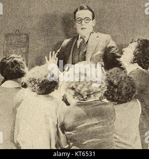 Stills from the 1924 film 'Girl Shy' capture scenes from the silent comedy, showcasing its early ...