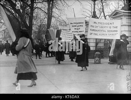 A historical photograph of the Woman Suffrage Picket Parade, a key ...
