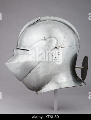 This image shows an armet, a type of medieval helmet, displayed at the ...