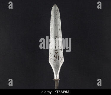 This artifact, labeled as Arrowhead YanonC493, is a historical piece ...