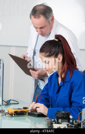 electrical equipment assembler Stock Photo - Alamy
