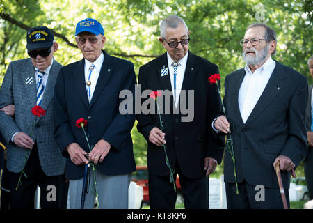 Decorated military veterans, including Navy SEAL Marcus Capone, meet ...